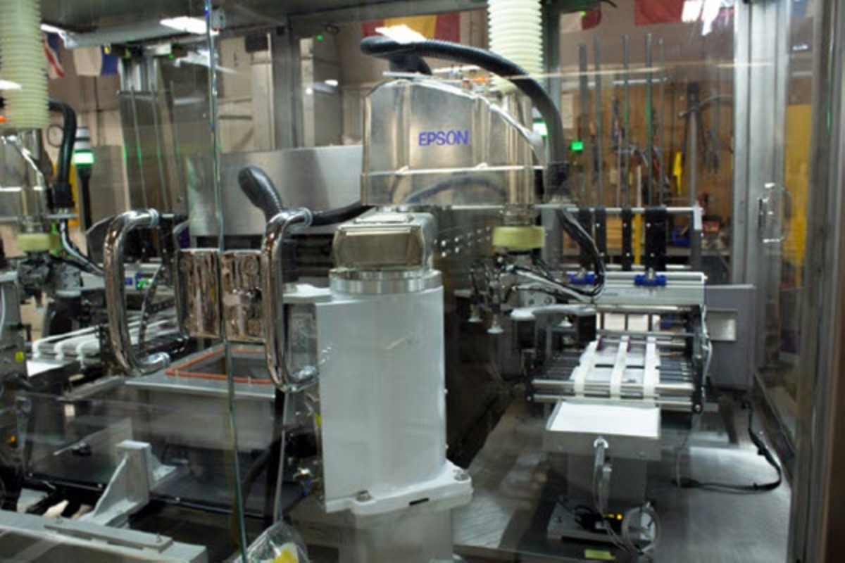 Case Study: Adopting Epson Cleanroom SCARA Robots for Medical Syringe ...
